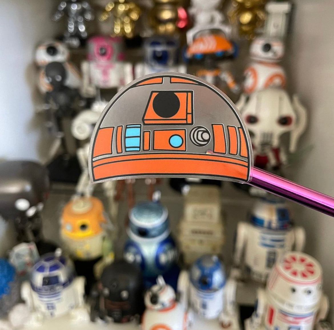 Clear and orange robot head Sticker – Lantern Pins